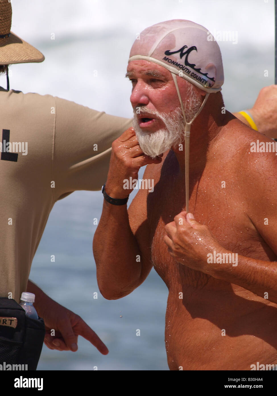 Senior lifeguard contestant prepares to start swimming compeition Stock ...