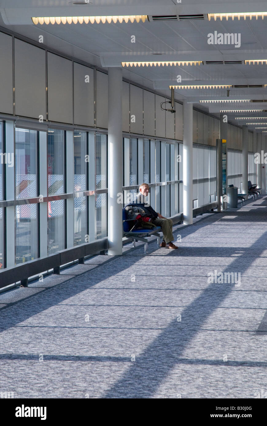 Travelling to departure gate 63 at Gatwick airport north terminal Stock Photo - Alamy
