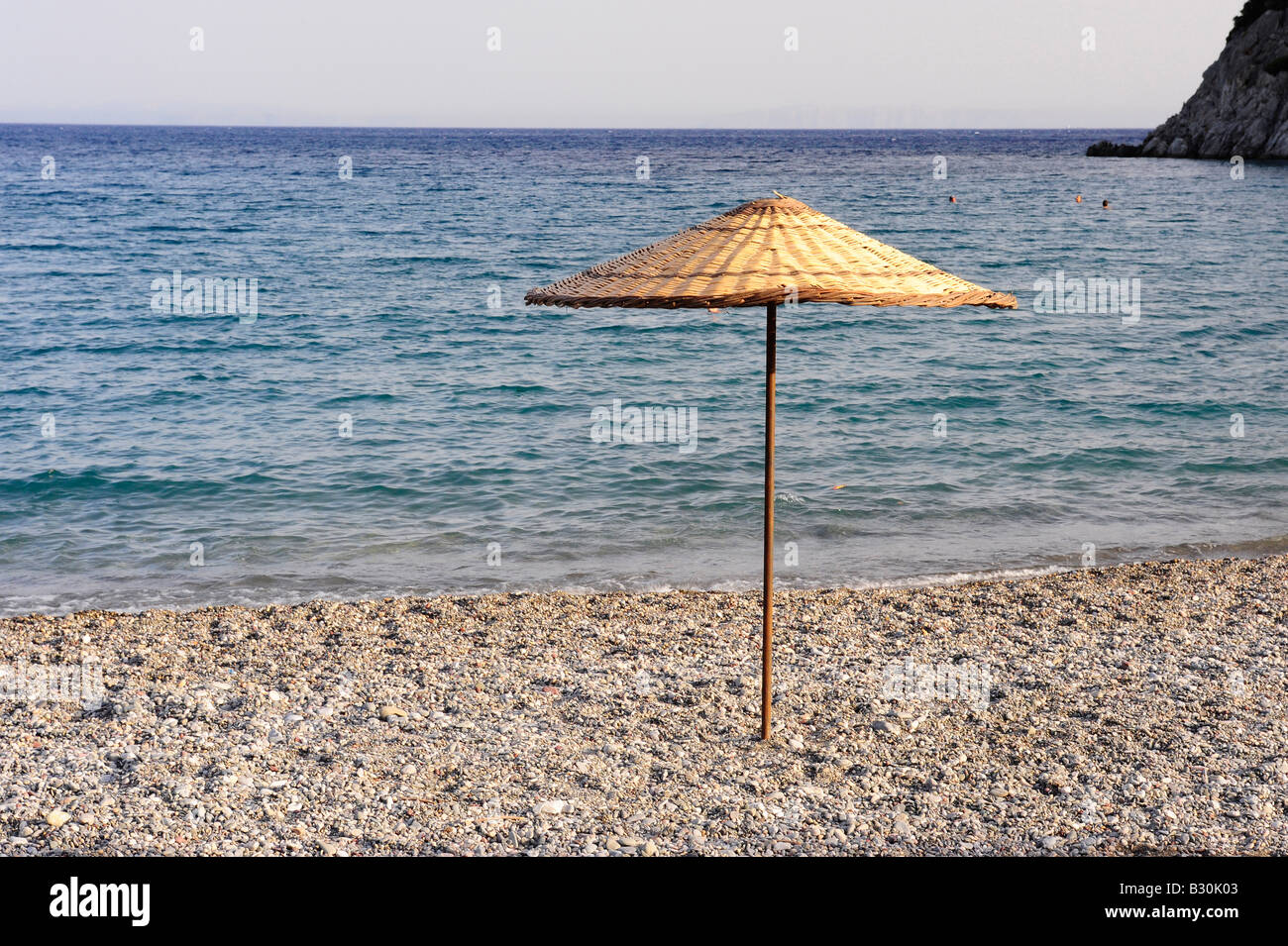 Parasol on a beach Stock Photo - Alamy