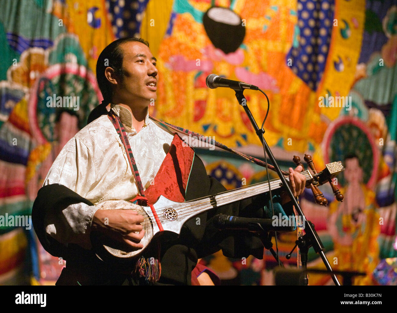 A TIBETAN MAN sings during the 14th DALAI LAMA teachings in October ...
