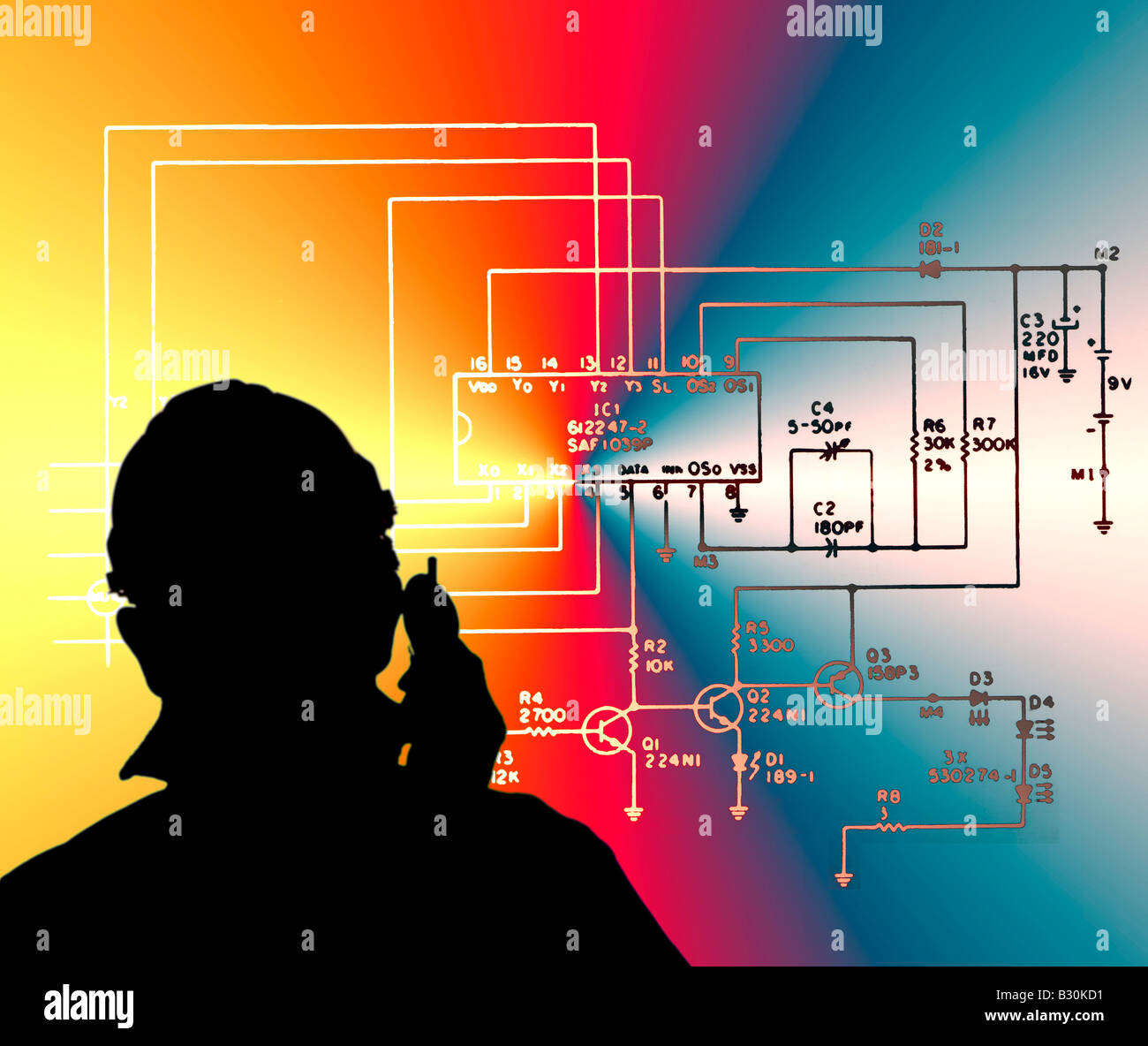 engineer with cell phone studying video diagram on screen Stock Photo ...