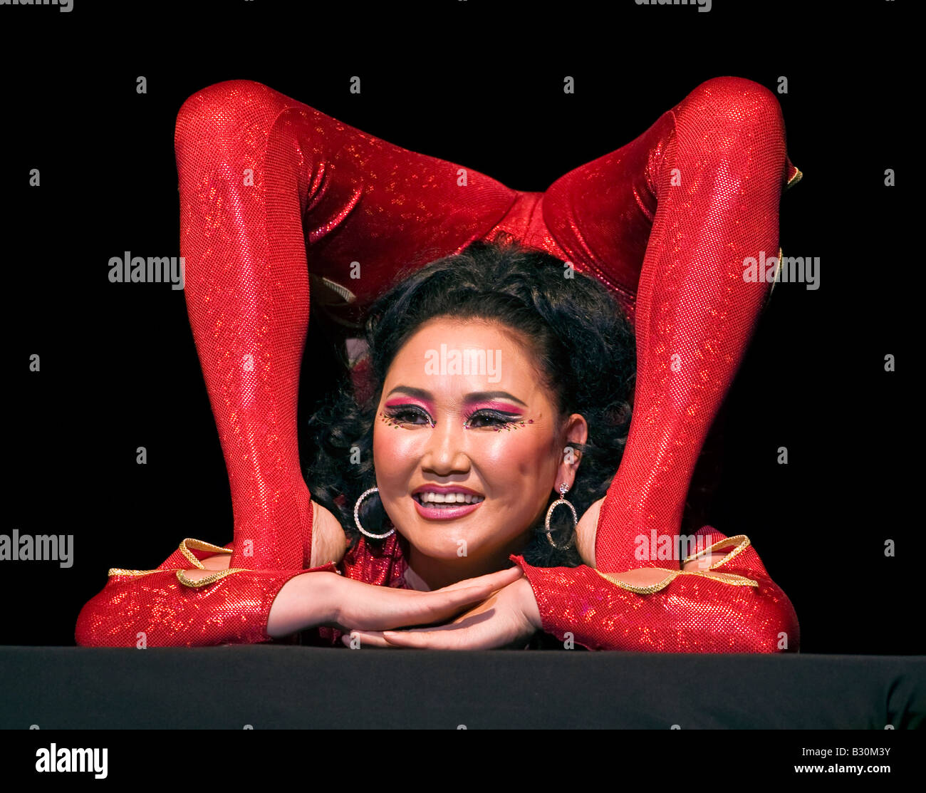 FEMALE CONTORTIONIST at a DALAI LAMA teaching sponsored by KUMBUM ...