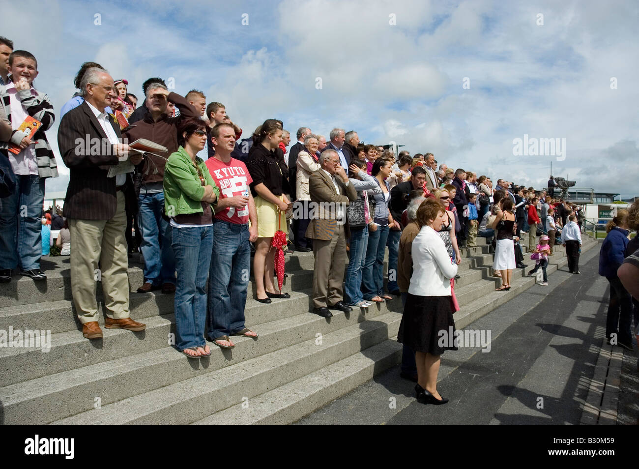 Crowd watching a race at the Galway Races, Ireland Stock Photo - Alamy