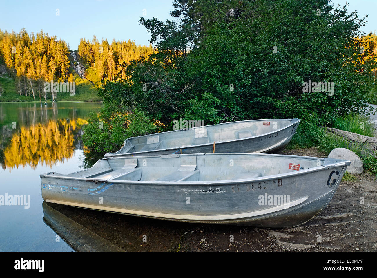 Pair of Boats on a Lake Stock Photo - Alamy