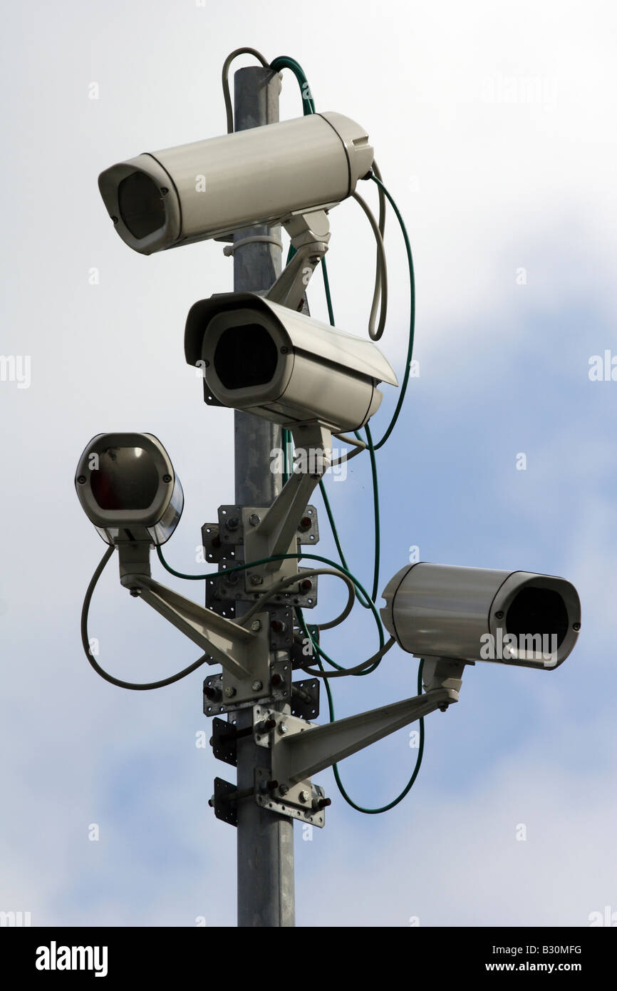 Four monitoring cameras Stock Photo - Alamy
