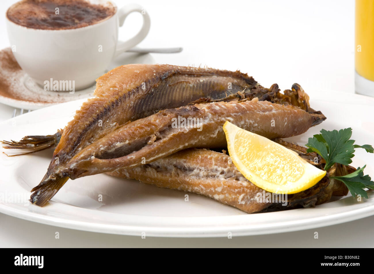 breakfast kippers toast orange juice cappuccino Stock Photo - Alamy