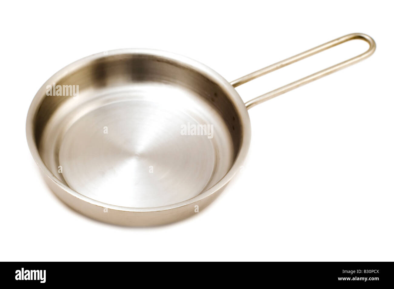 object on white kitchen utensil frying pan Stock Photo - Alamy