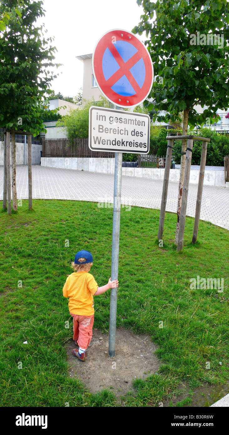 Small boy in a turning circle hi-res stock photography and images - Alamy