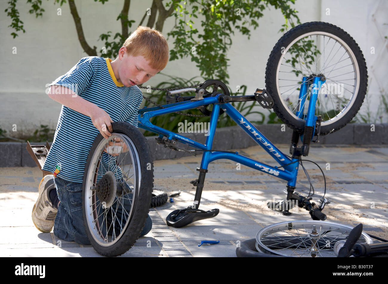 Fixing Puncture High Resolution Stock Photography and Images - Alamy