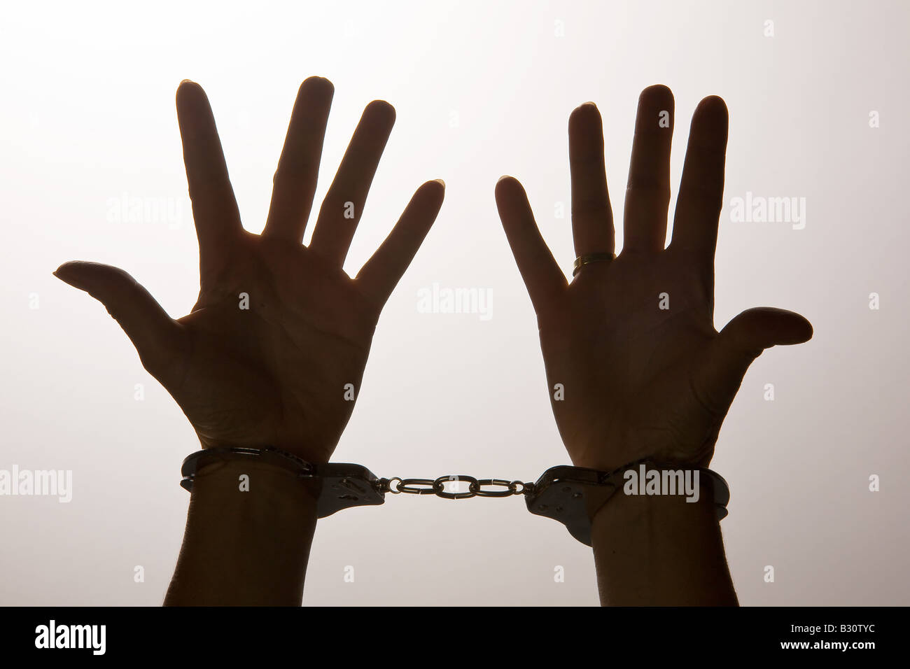 Shackled hand hi-res stock photography and images - Alamy