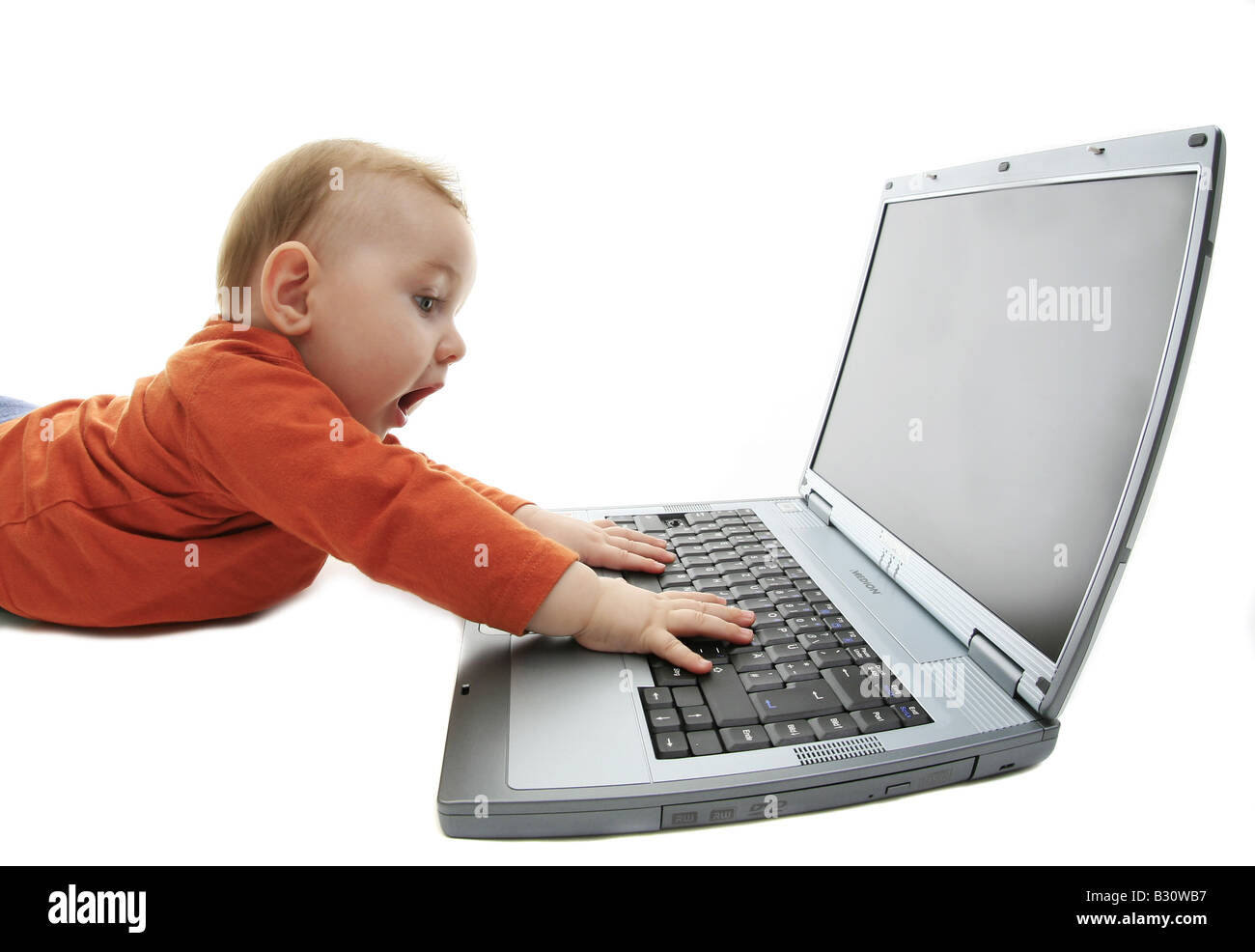 baby playing with laptop Stock Photo - Alamy