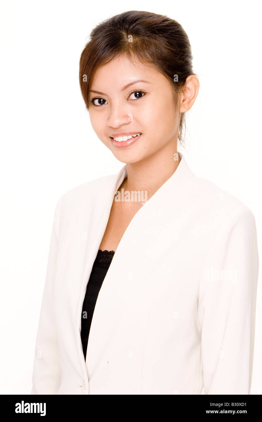 A beautiful young asian woman in white on white background Stock Photo ...