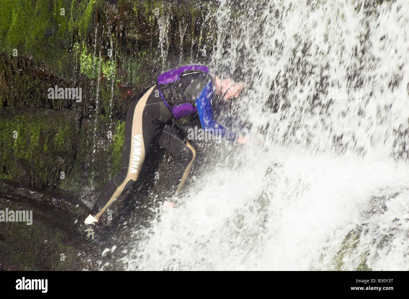 Man under waterfall hi-res stock photography and images - Alamy