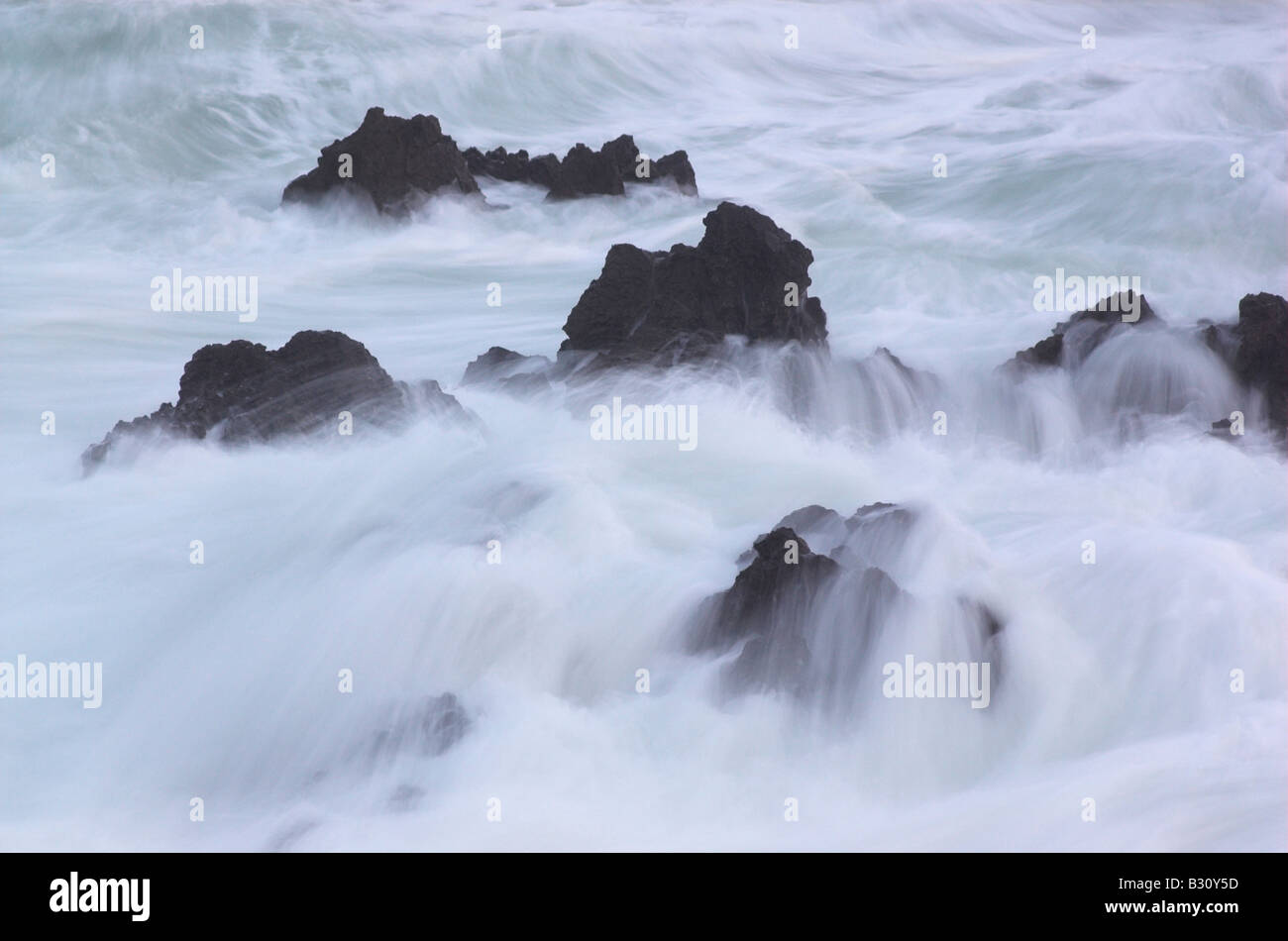 Waves splashing over rocks on hi-res stock photography and images - Alamy