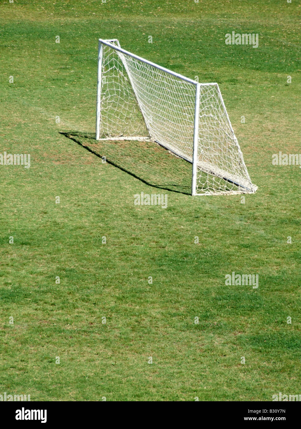 detail of football goal posts in green field in sun Stock Photo - Alamy