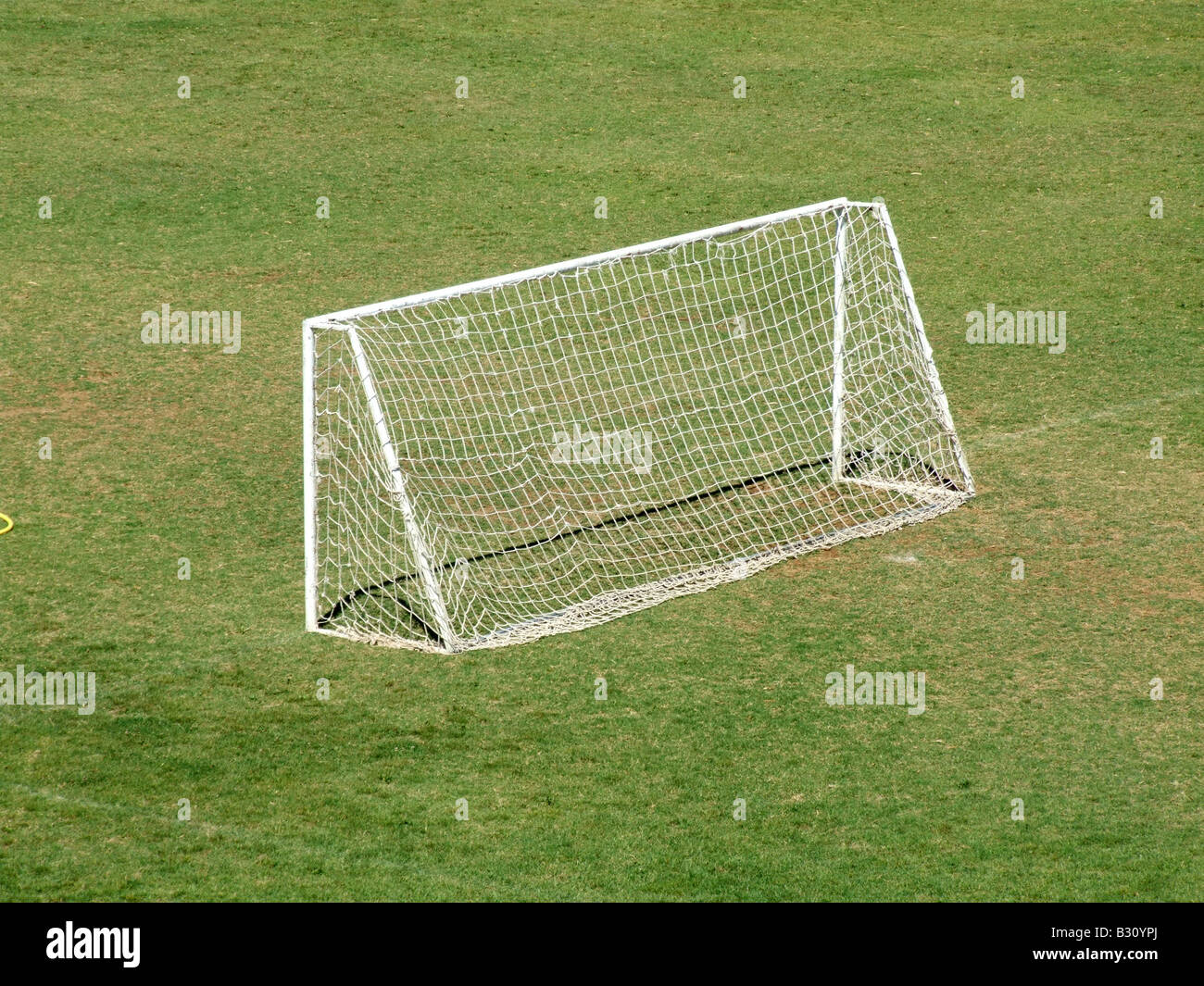 detail of football goal posts in green field in sun Stock Photo - Alamy
