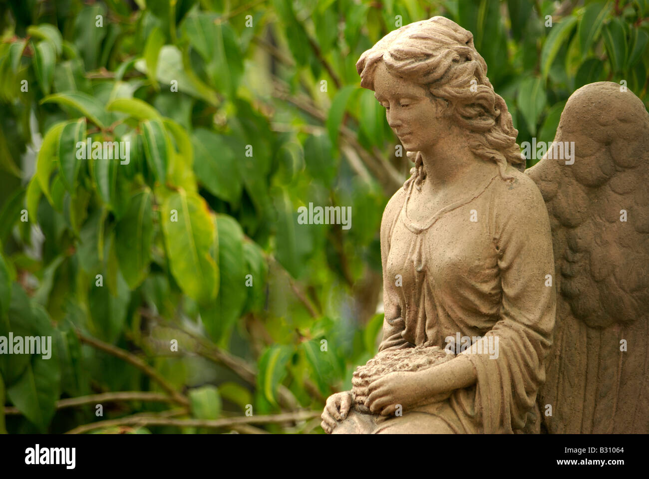 Seated angel hi-res stock photography and images - Alamy