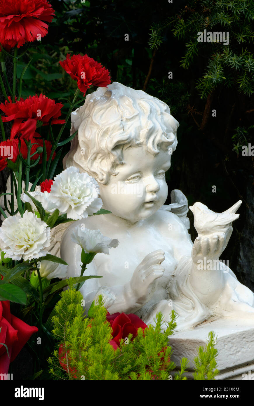 Angel holding bird hi-res stock photography and images - Alamy