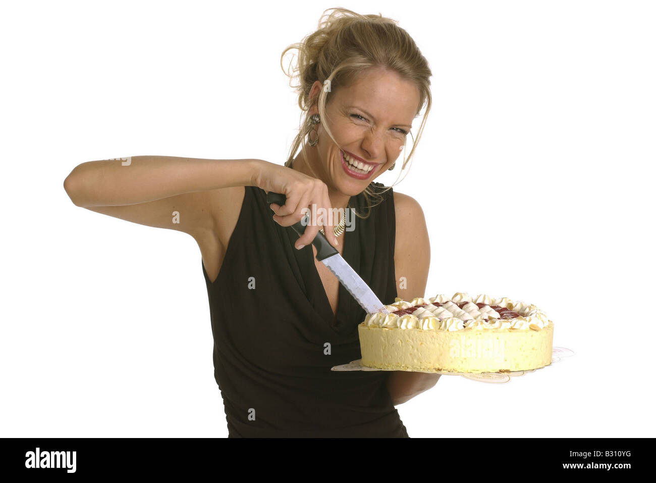 young woman clad in a party dress with a birthday cake Stock Photo - Alamy