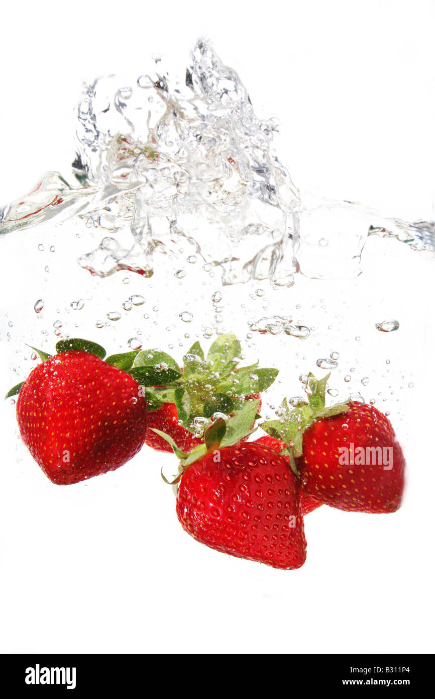 Strawberries in the water Stock Photo - Alamy