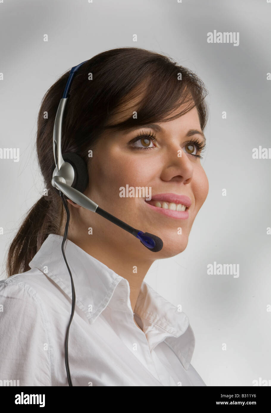 Woman with Head set Stock Photo - Alamy