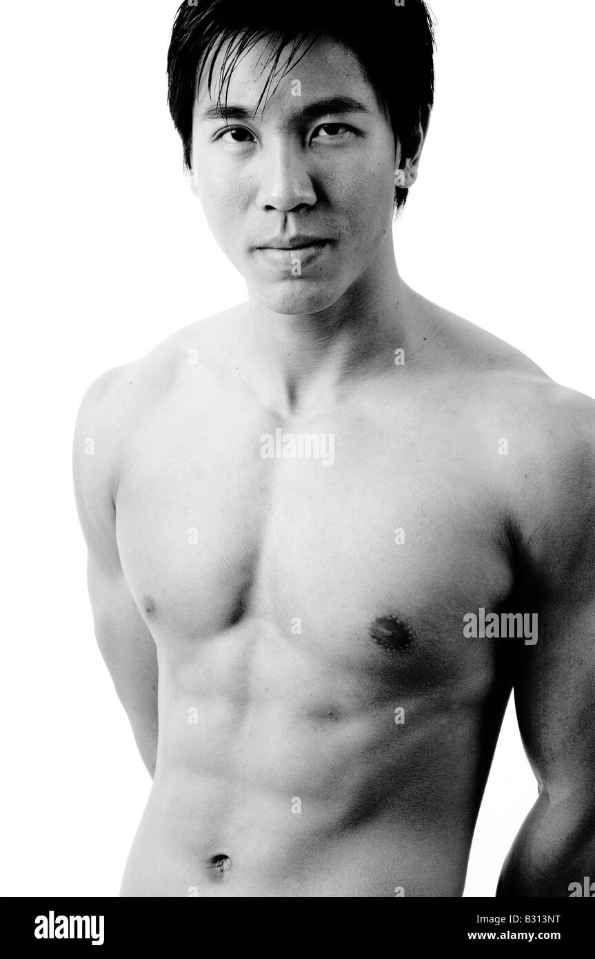 A muscular chinese male model on white background (monochrome Stock ...