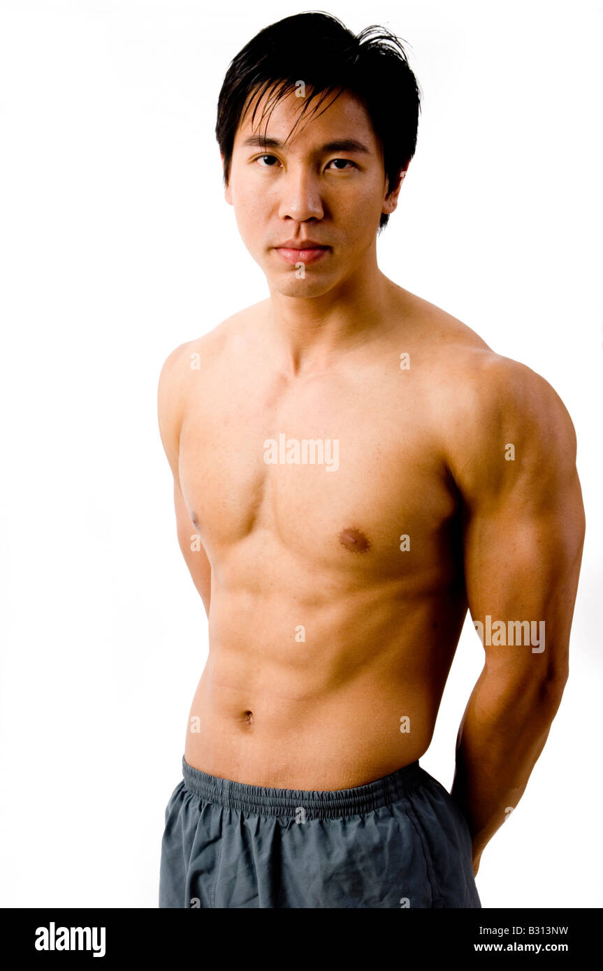 A colour picture of muscular chinese model Stock Photo - Alamy