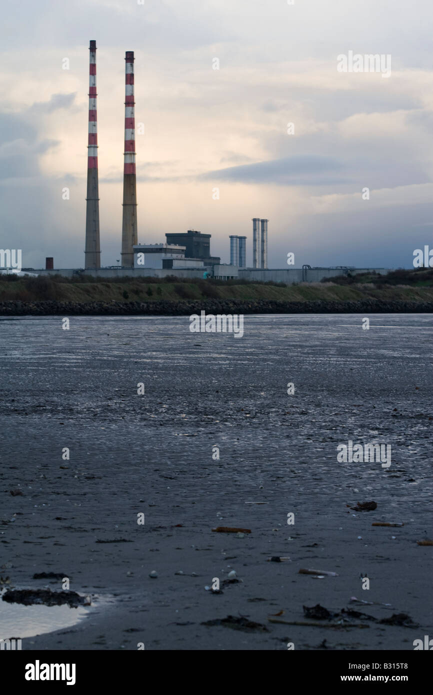 Poolbeg cooling towers from Sandymount strand in Dublin Bay Stock Photo ...