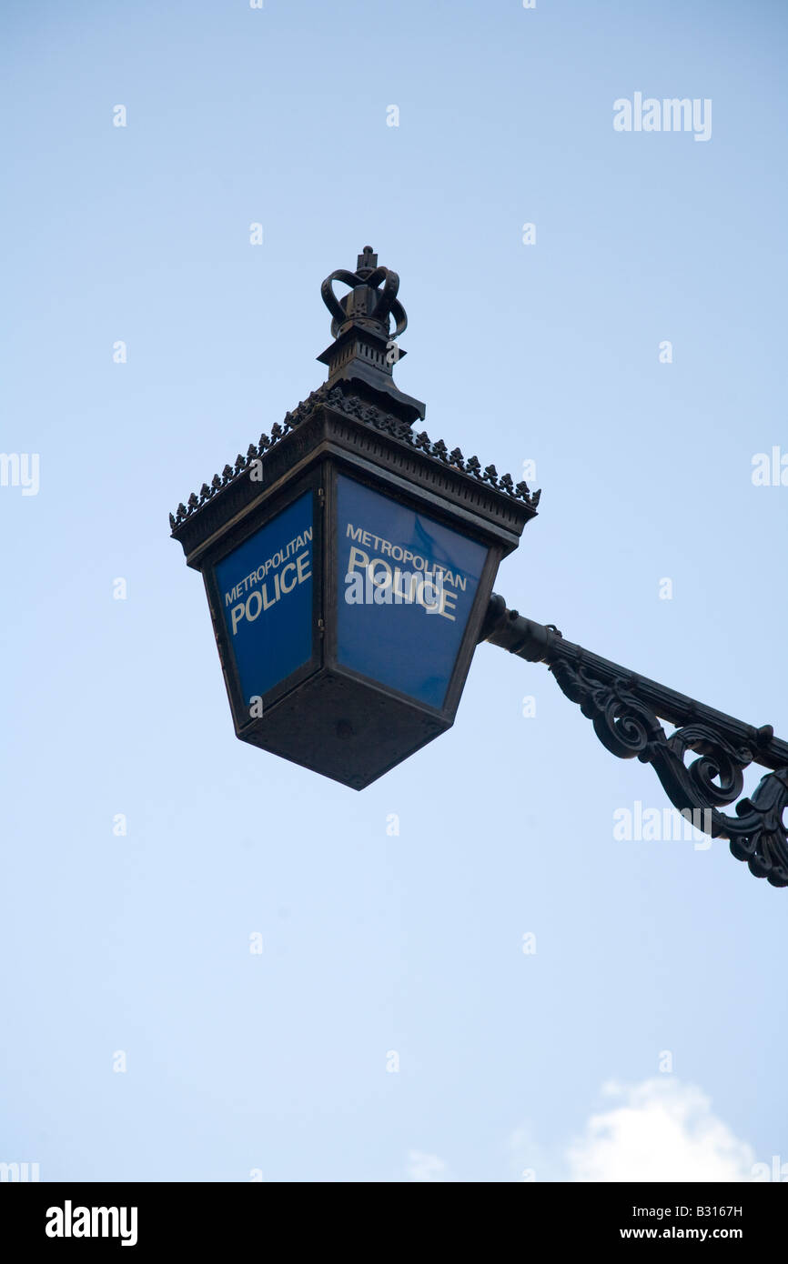 Traditional metropolitan police lamp post outside a police station ...