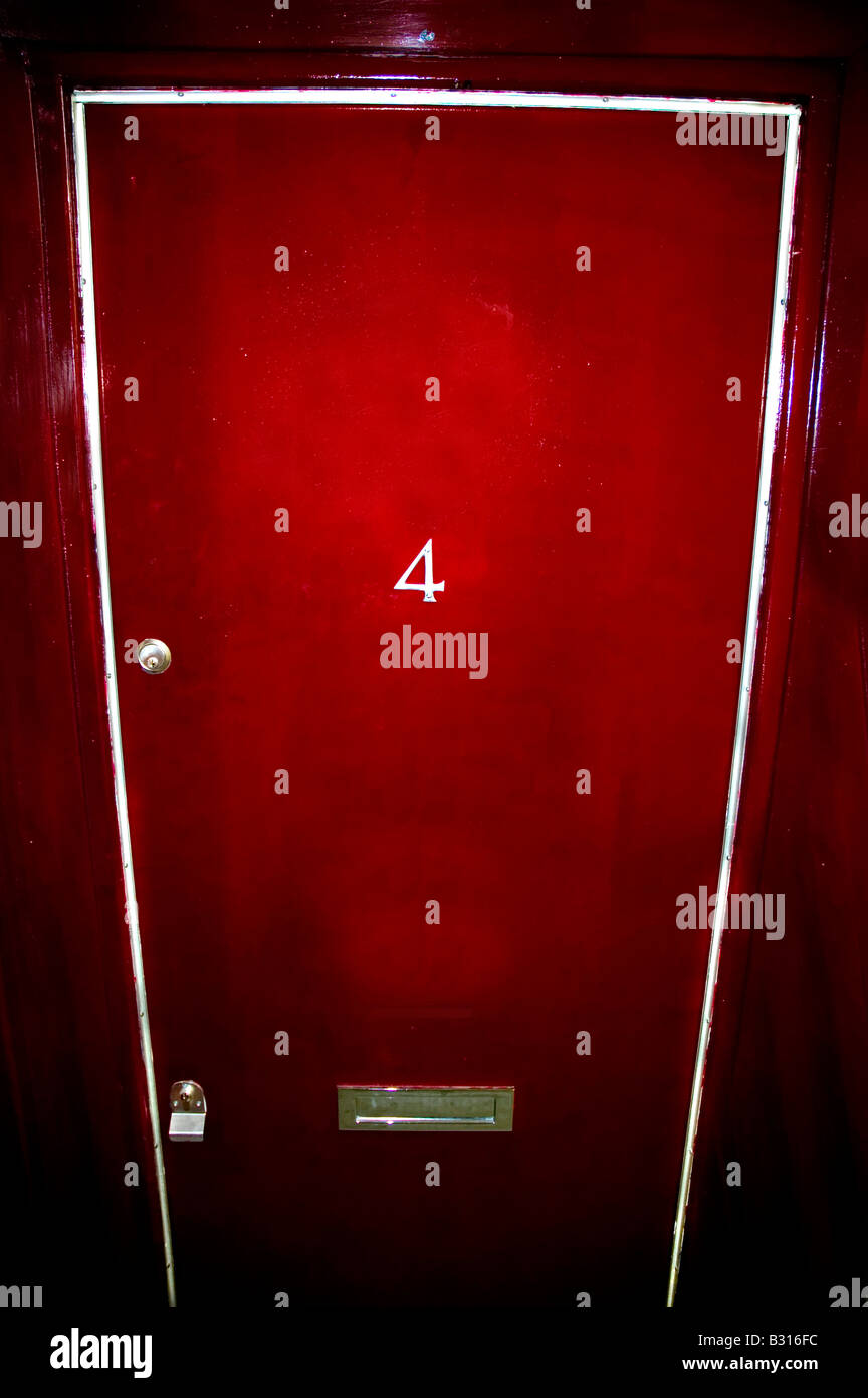 A red and white door with the number four on it Stock Photo - Alamy