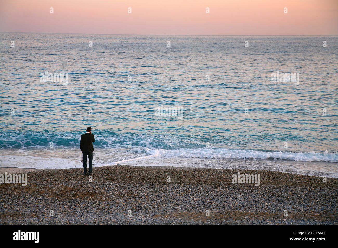 Alone on the beach Stock Photo - Alamy