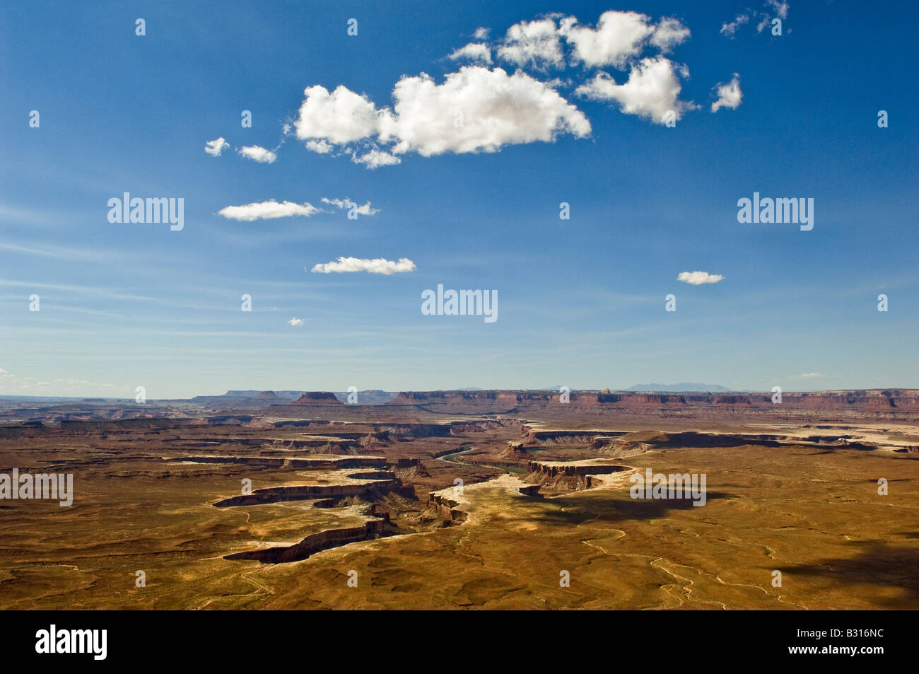 Landscape format aerial colour picture of clouuds over fissures and ...