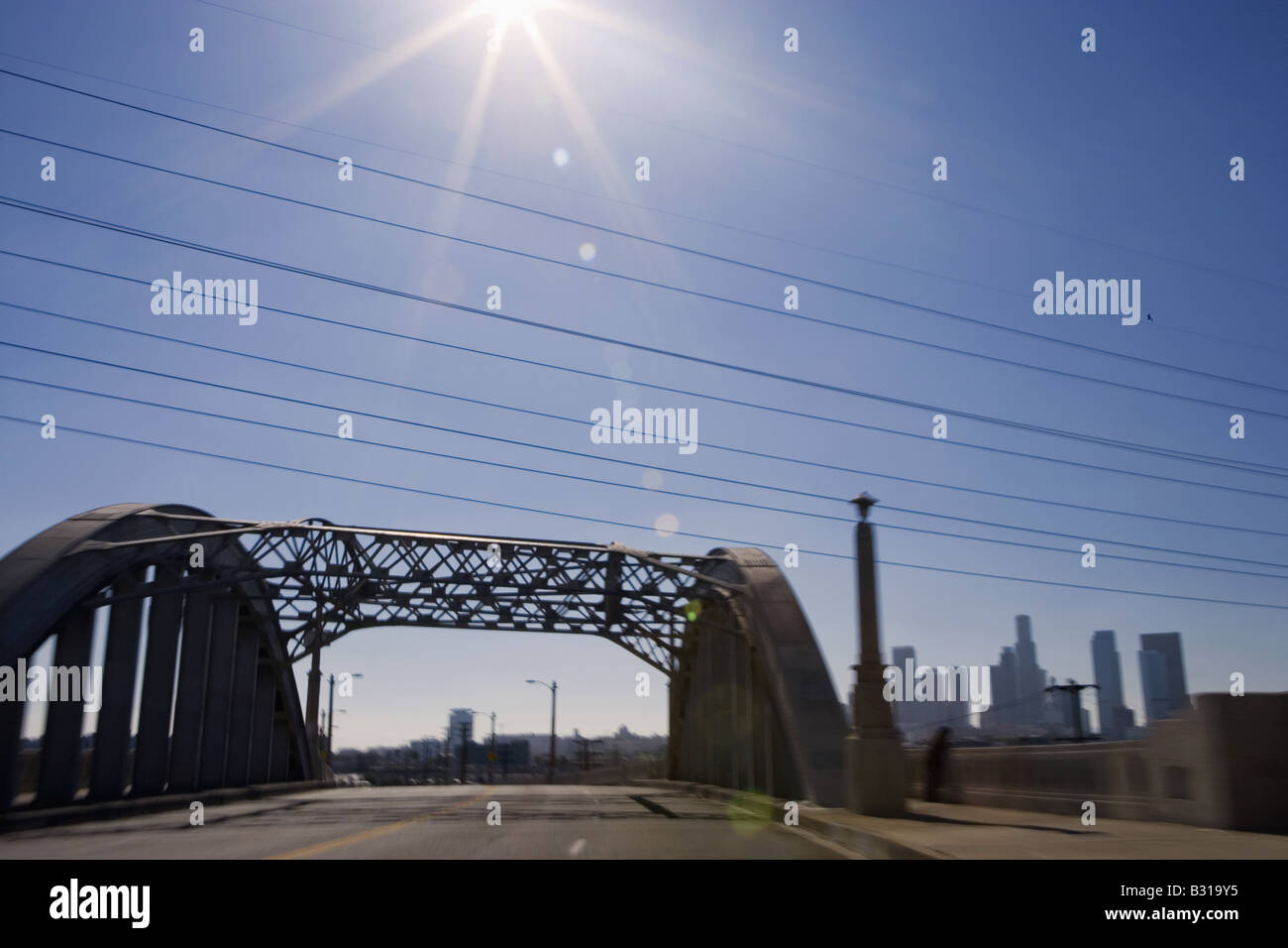 Sunlight on bridge Stock Photo - Alamy