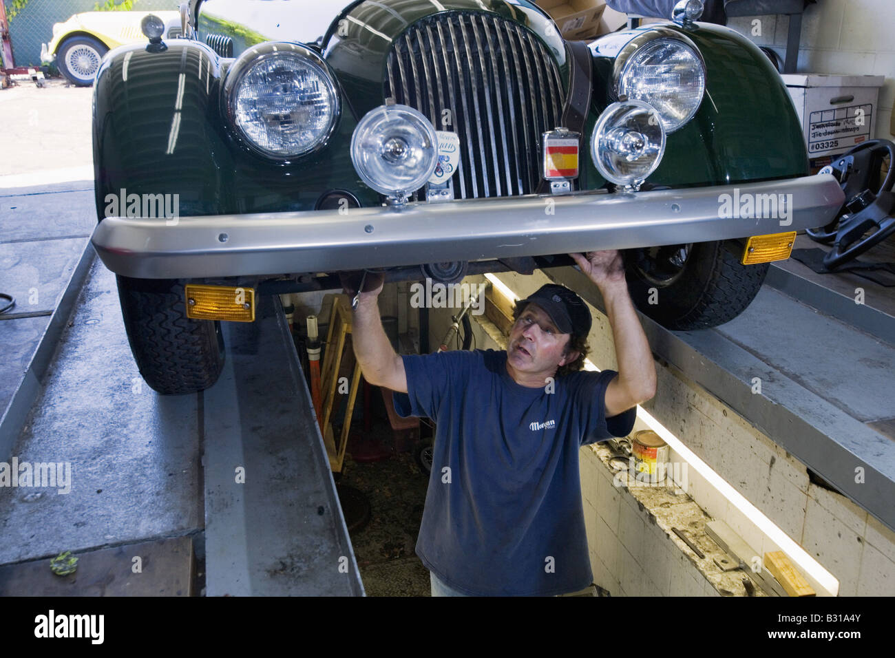 Mechanic working on Morgan Stock Photo - Alamy
