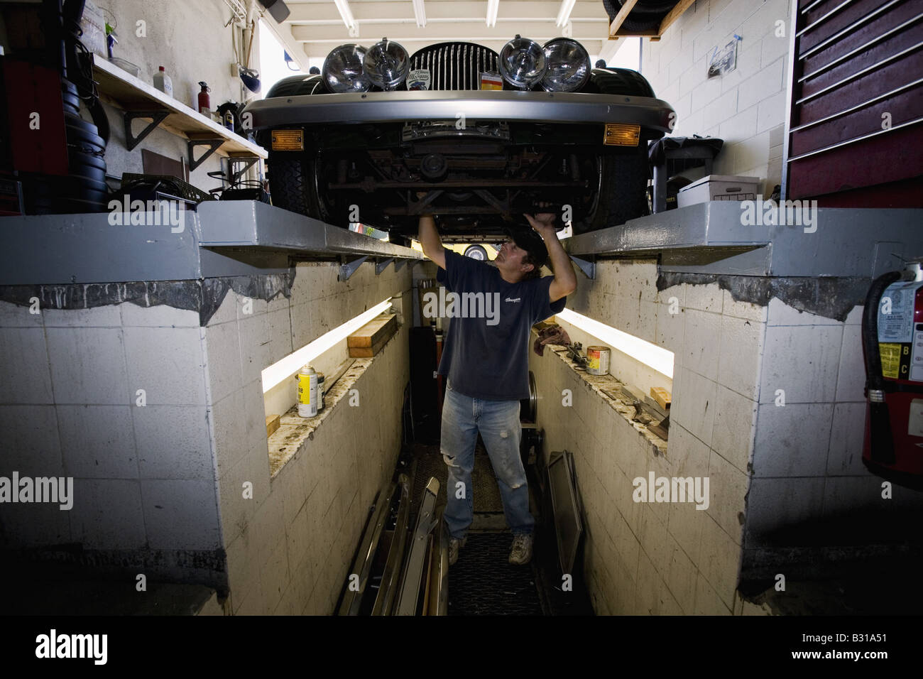 Mechanic working on Morgan Stock Photo - Alamy