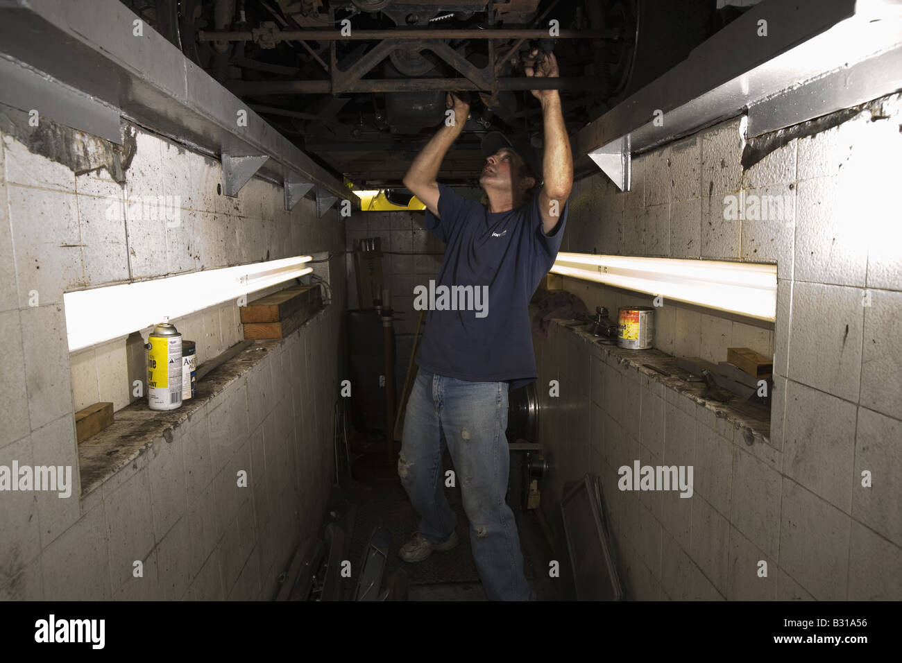 Mechanic working on Morgan Stock Photo - Alamy