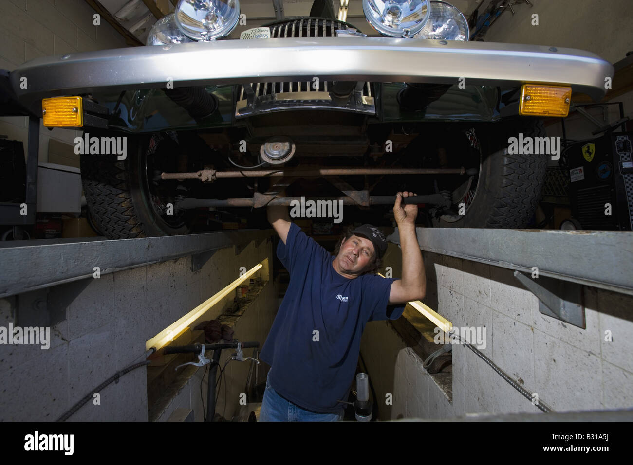 Mechanic working on Morgan Stock Photo - Alamy