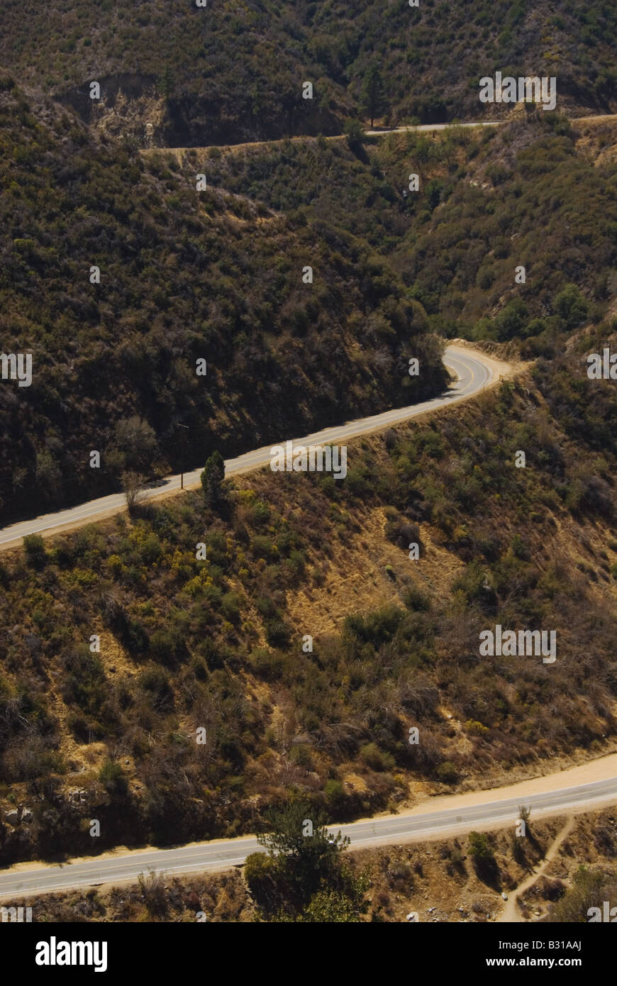 Road winding through mountains Stock Photo - Alamy