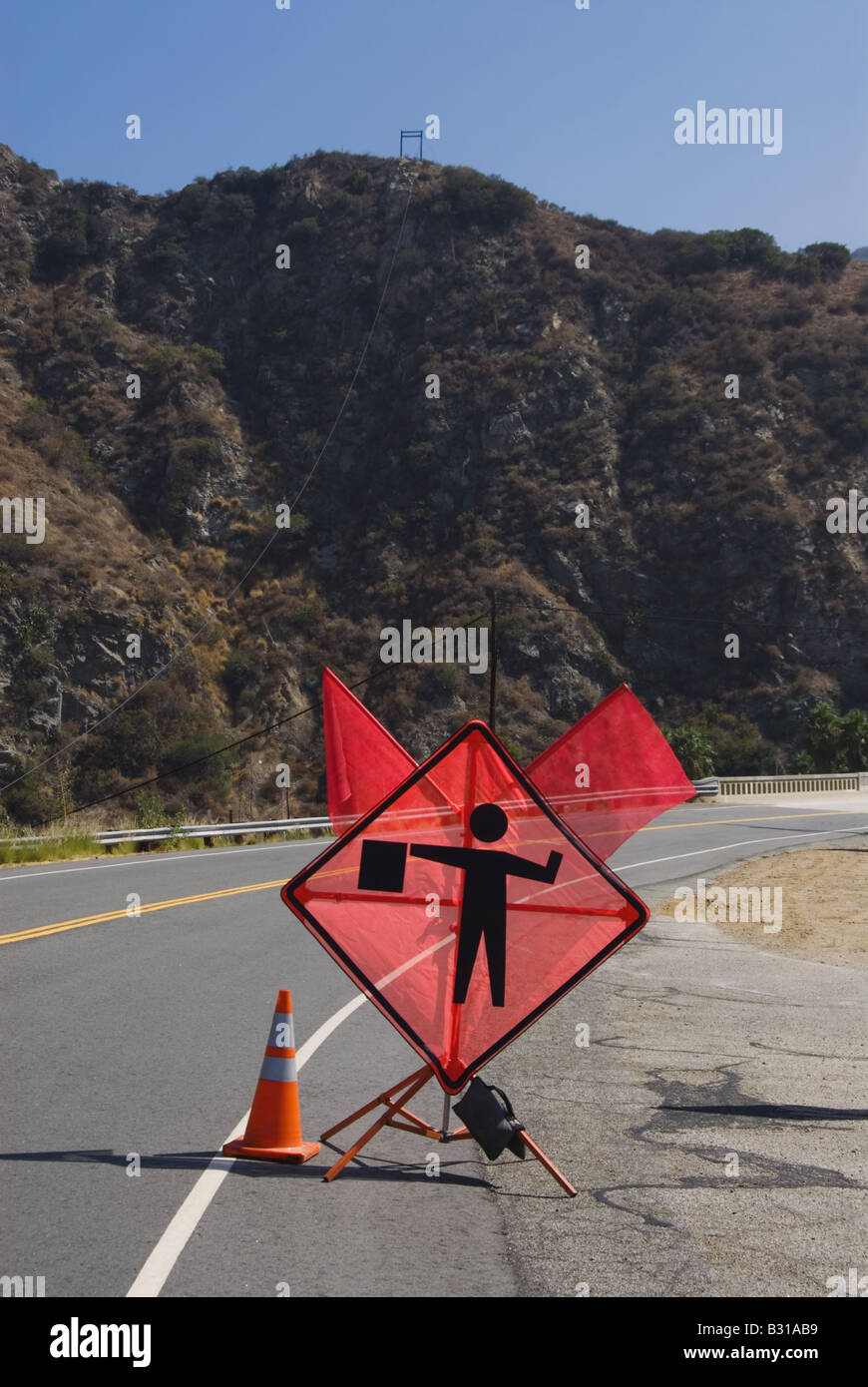 Construction sign on road Stock Photo - Alamy
