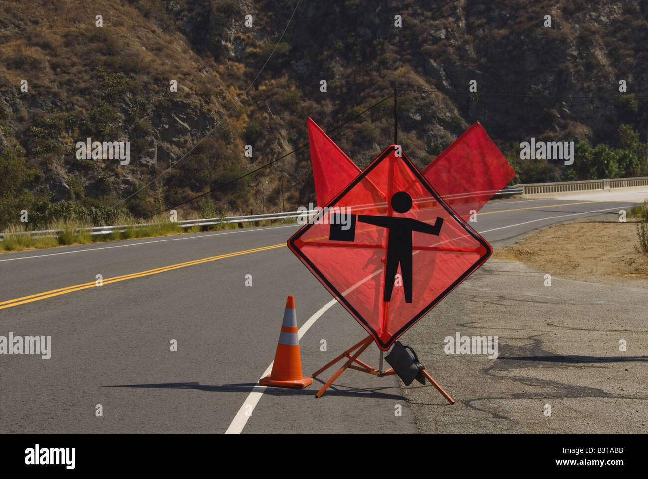 Construction sign on road Stock Photo - Alamy