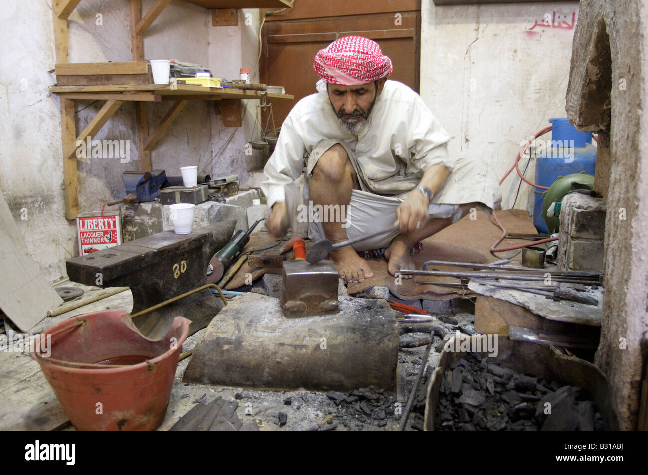 Blacksmith at work, Abu Dhabi, United Arab Emiarates Stock Photo - Alamy