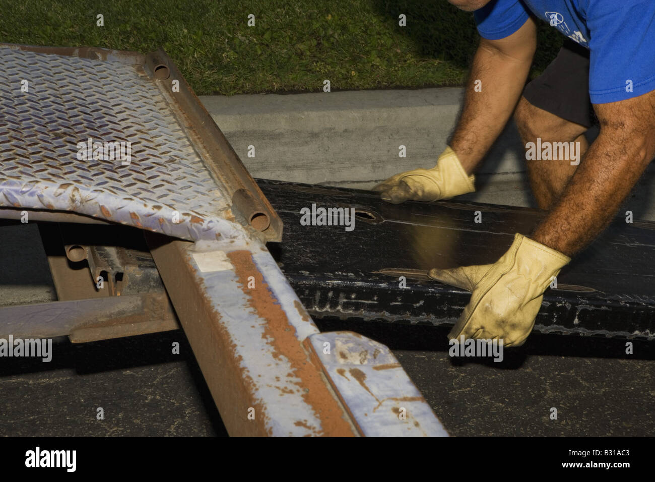 Loading ramp onto trailer Stock Photo - Alamy