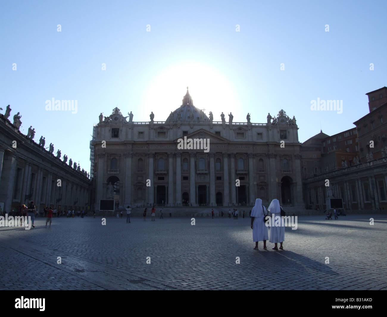 two nuns walking in the vatican square, rome Stock Photo - Alamy