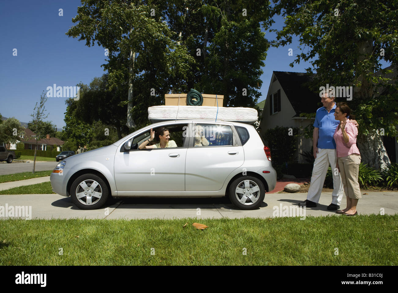 Waving Goodbye From Car