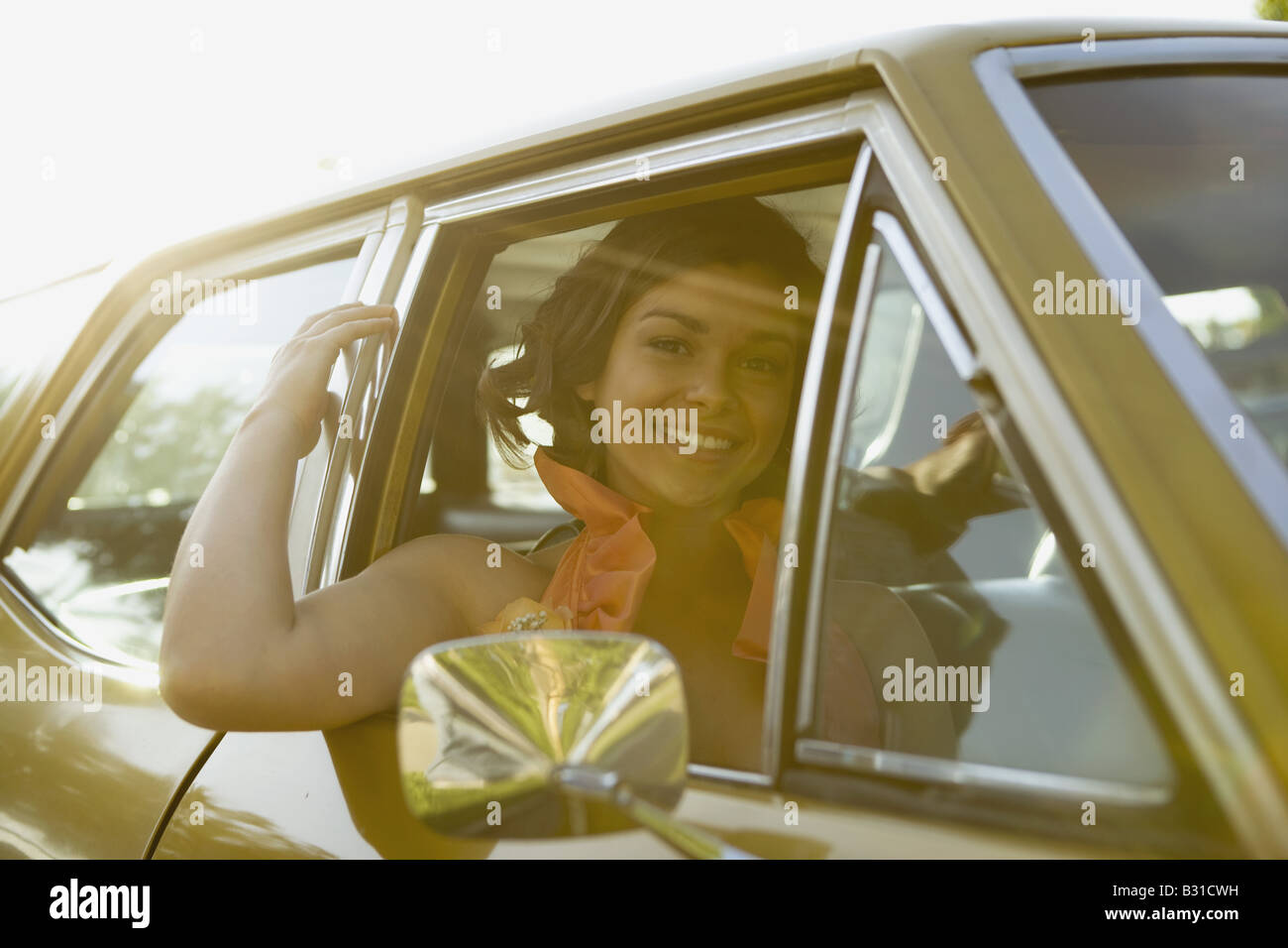 Young woman in car going to prom Stock Photo - Alamy
