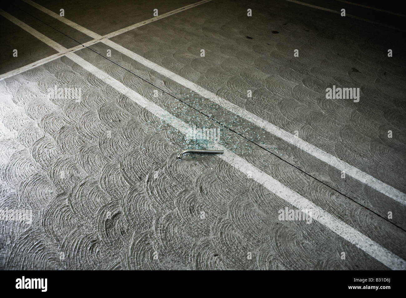 Crowbar and broken glass in car park Stock Photo - Alamy