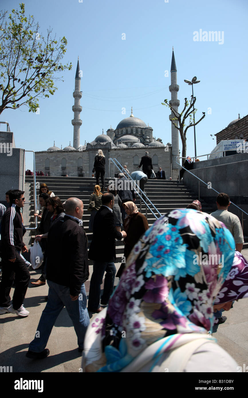 TUR Turkey Istanbul People in front of New Mosque Yeni Cami in Eminönü ...