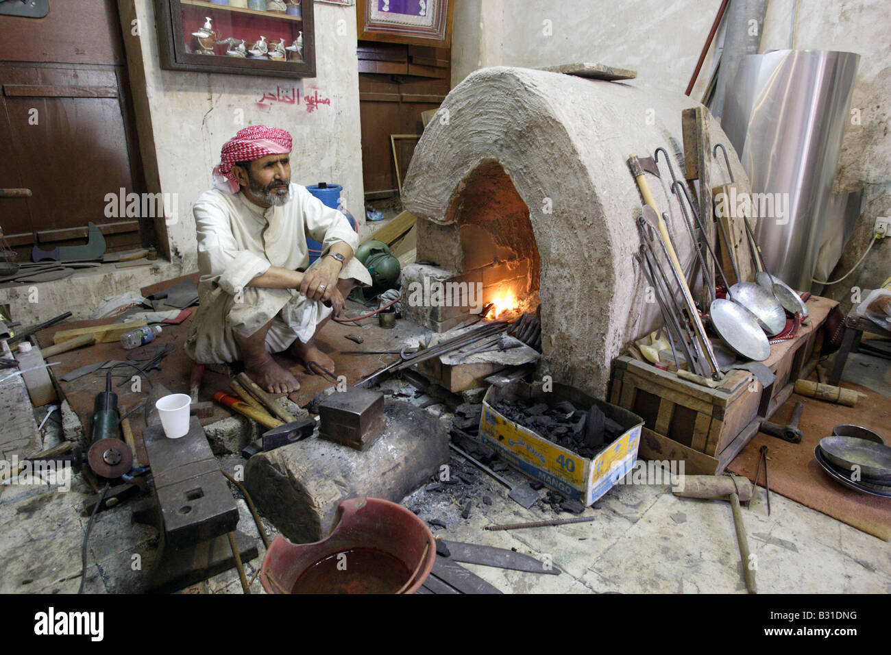 Blacksmith at work, Abu Dhabi, United Arab Emiarates Stock Photo - Alamy