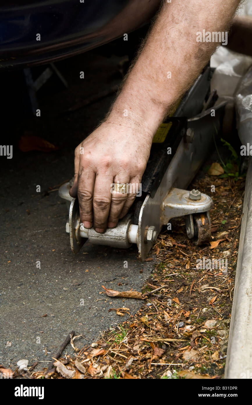 Jacking car cars hi-res stock photography and images - Alamy