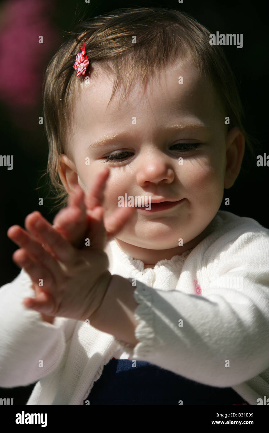 Baby girl clapping hands hi-res stock photography and images - Alamy